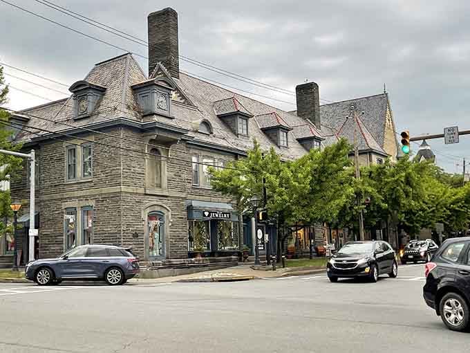 Stone mansions with proud chimneys stand guard over Milford's bustling corner, where the jewelry shop catches every passing glance.