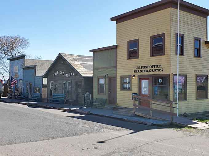The post office still operates in this yellow building where mail has been sorted for generations.