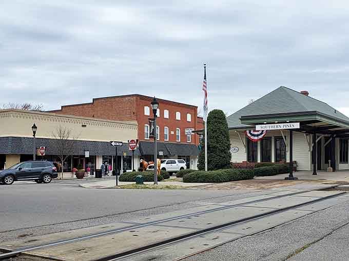 Railroad tracks and historic depot remind you when trains connected small towns to the wider world beyond.