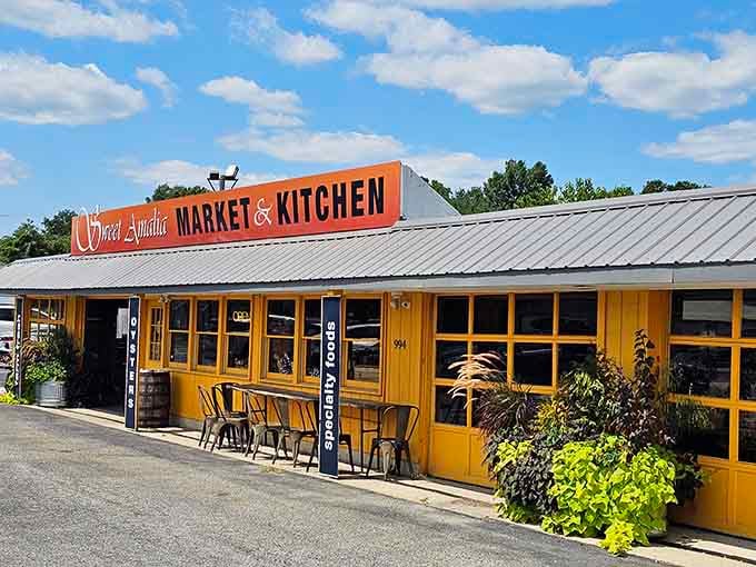 Those metal chairs out front aren't just decoration—they're front-row seats to some seriously delicious farm-fresh cooking and community spirit.