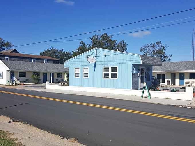 That cheerful turquoise building pops against the landscape like a mint julep on a hot day, refreshing and unexpected.