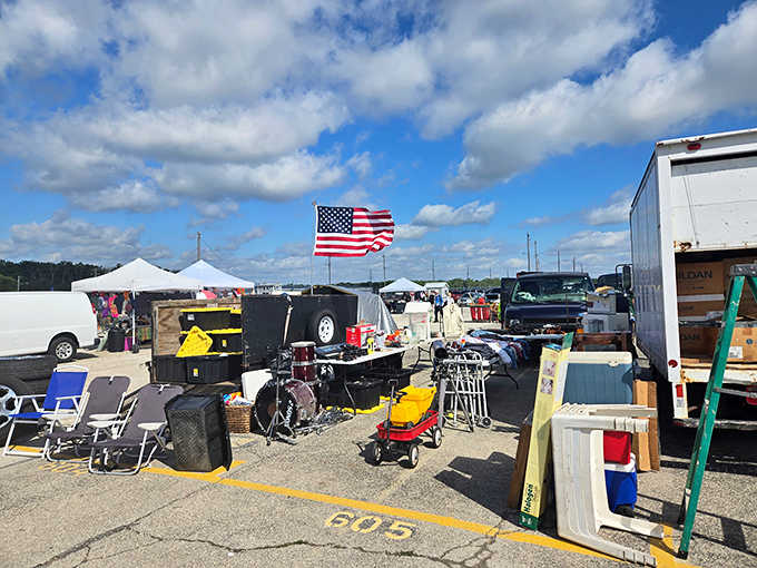 The outdoor section sprawls under open sky, where American flags wave over treasures waiting to find new homes.