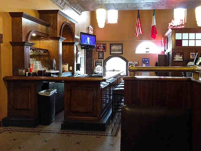 That wooden bar with its arched backdrop serves everything from Italian Sangria to California Cabernet with equal southern Illinois hospitality.
