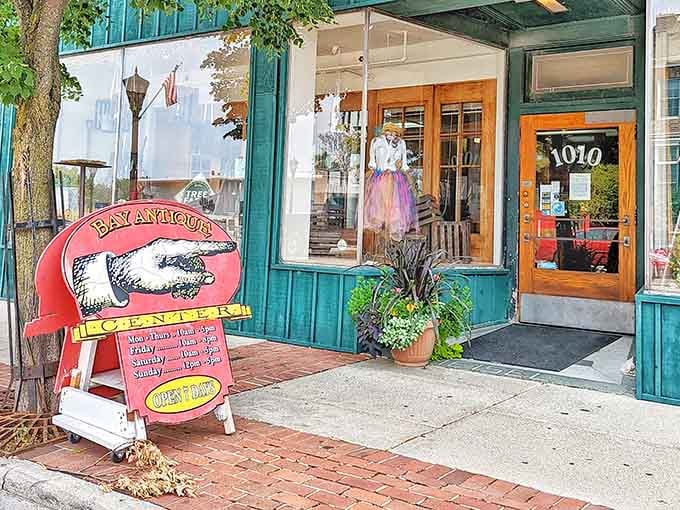 The cheerful sidewalk sign keeps you informed, because even treasure hunters need to know when the hunting grounds are open.