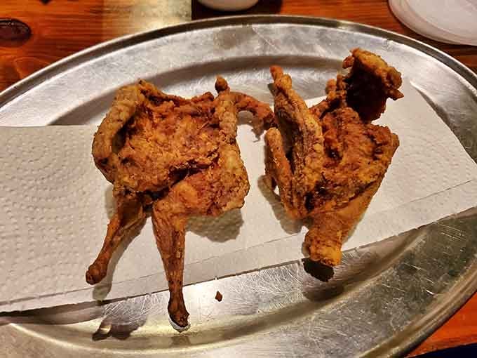 Fried quail standing at attention like tiny delicious soldiers reporting for duty on your taste buds.