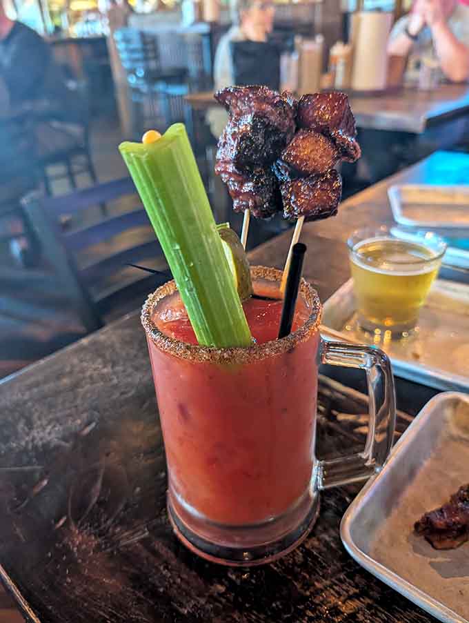 That Bloody Mary garnished with bacon skewers proves brunch and barbecue were always meant to be together, finally united.