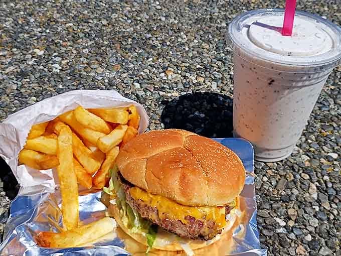 The complete experience: golden fries, a thick milkshake, and a burger that makes every calorie completely worth the indulgence.