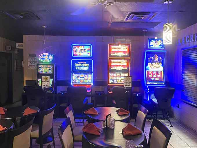 A little gaming area adds entertainment options for those waiting on their legendary steak dinner table.