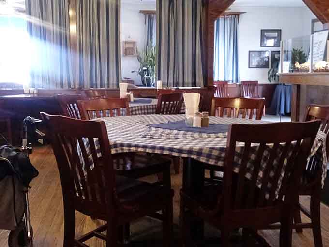 Sunlight streams through windows onto tables that have hosted countless conversations, celebrations, and second helpings of pie.