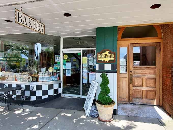 Bracken Mountain Bakery's checkered awning signals carbs ahead, the essential fuel for any successful treasure-hunting expedition through downtown shops.