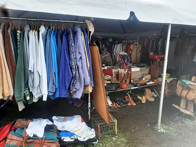 Vintage clothing racks displaying decades of fashion, from bell bottoms to blazers, waiting for their second chance at glory.