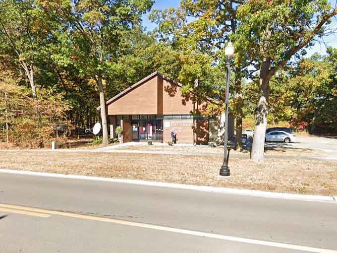 Even the post office here looks charming, nestled among trees like it's hiding from the stress of modern mail delivery.
