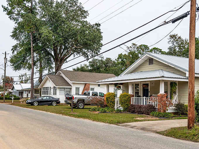 Residential neighborhoods feature actual yards and porches, not concrete balconies overlooking parking garages and despair.