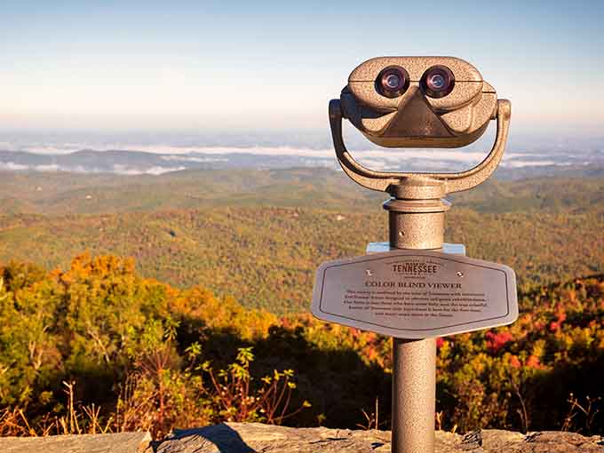 That vintage viewing scope has witnessed more sunrises than most of us have had hot breakfasts, standing sentinel over endless peaks.