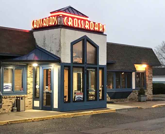 Even at dusk, that glowing sign promises warm hospitality and even warmer sandwiches waiting inside for you.
