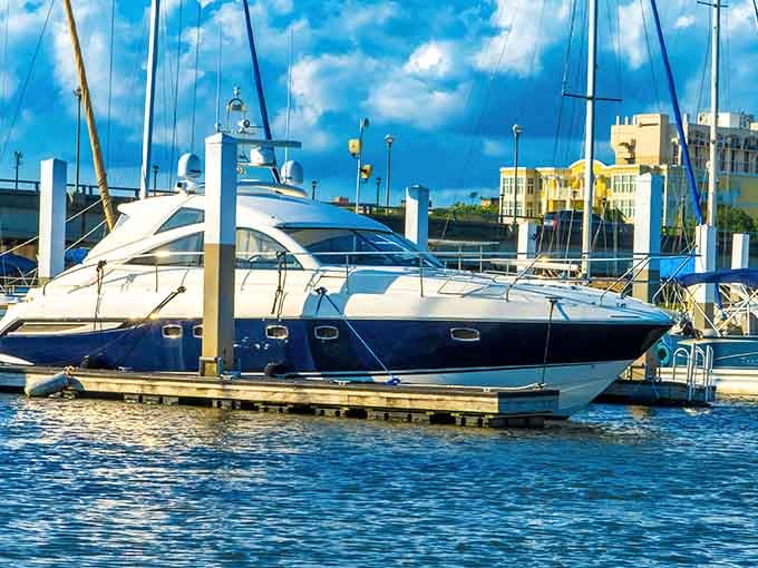 Sleek yachts bob in their slips, their owners probably wondering why they didn't think of the floating tiki bar first.