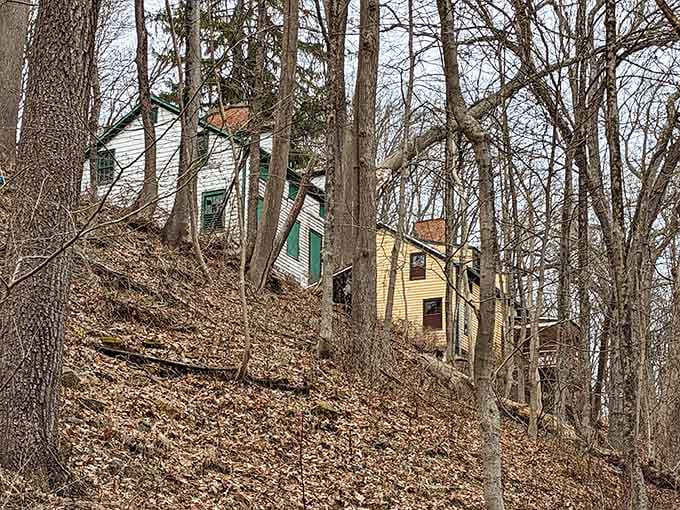 Perched on the hillside like it's trying to decide whether to slide down or just stay put forever.