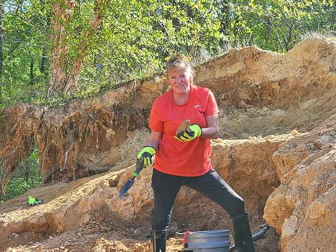 Victory stance achieved after unearthing another specimen, proving persistence beats luck every single time here.