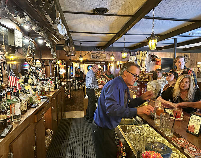 The bar buzzes with friendly energy as locals and visitors alike gather for good drinks and better company.