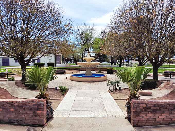 A central fountain surrounded by desert landscaping creates an oasis where neighbors actually stop to chat and linger.