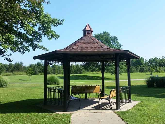 Classic gazebo providing shade and shelter, the perfect spot for reading or watching park activities unfold.