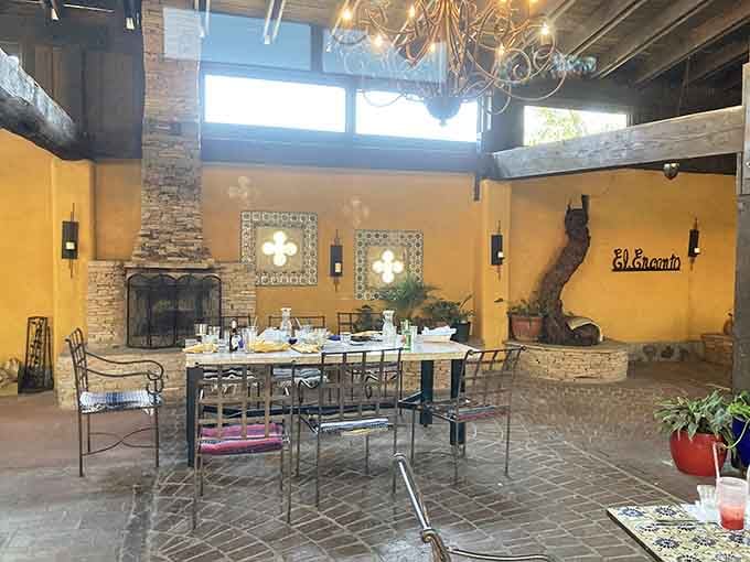 The dining room where exposed beams and warm lighting create ambiance that makes every meal feel like a celebration.
