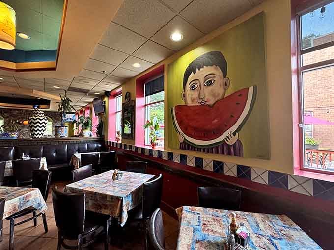 The whimsical watermelon art adds personality to a space that's already bursting with character and charm.