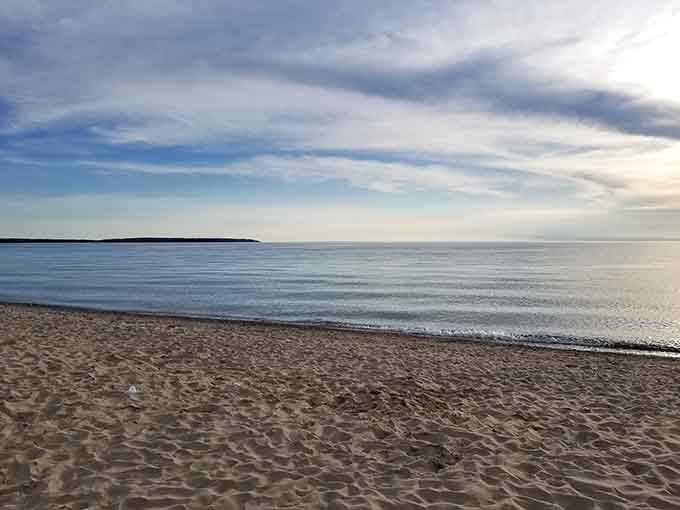 That mirror-smooth water and endless horizon create the kind of serenity that makes your blood pressure drop instantly.