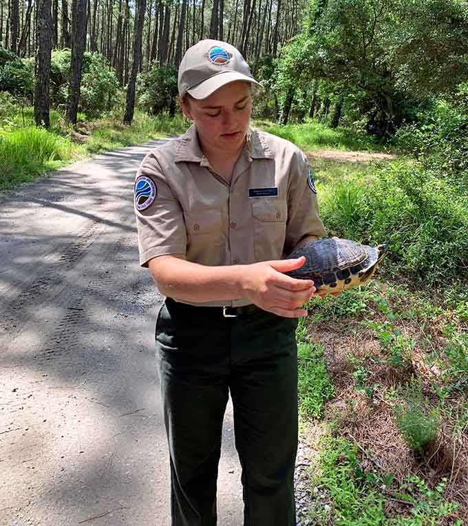 Park rangers share their knowledge with visitors who earned this education through serious pedaling effort.