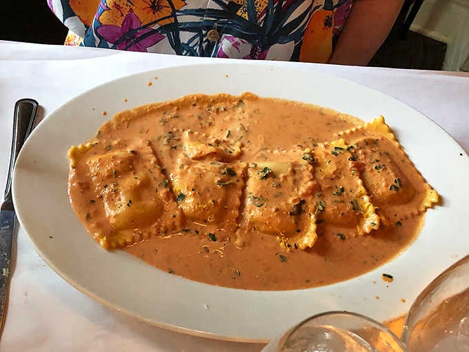 Ravioli swimming in creamy sauce, the kind of comfort food that makes everything else fade away.