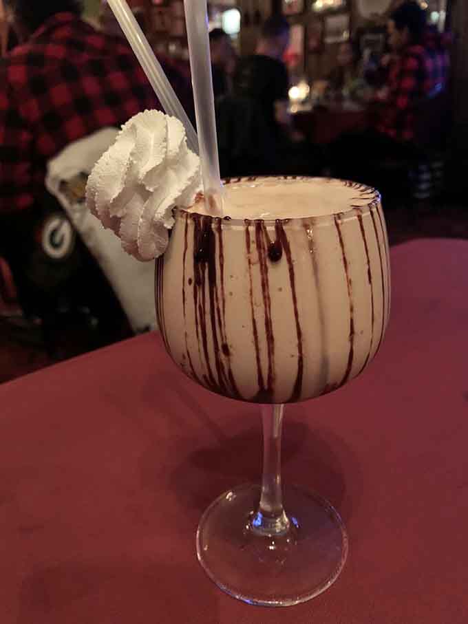 The Pink Squirrel: a retro Wisconsin classic that's basically dessert in a glass with whipped cream.