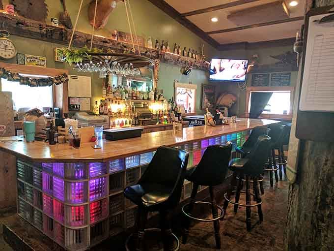 That colorful bar glow suggests someone here knows how to make waiting for your table an experience itself.