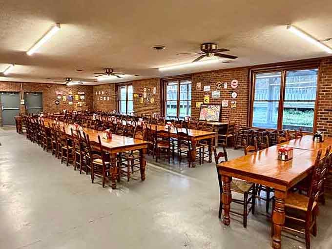 Row after row of wooden tables waiting to welcome hungry visitors into this temple of slow-smoked Southern barbecue tradition.