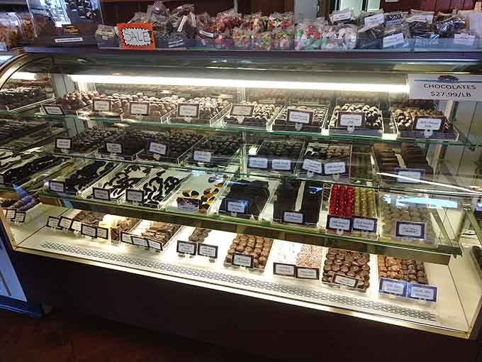 This chocolate display case is basically a glass barrier between you and pure happiness, organized by delicious categories.