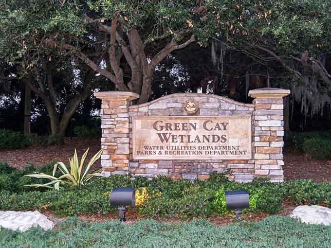 The entrance sign marks the gateway to 100 acres where wildlife outnumbers humans and everyone's happier for it.