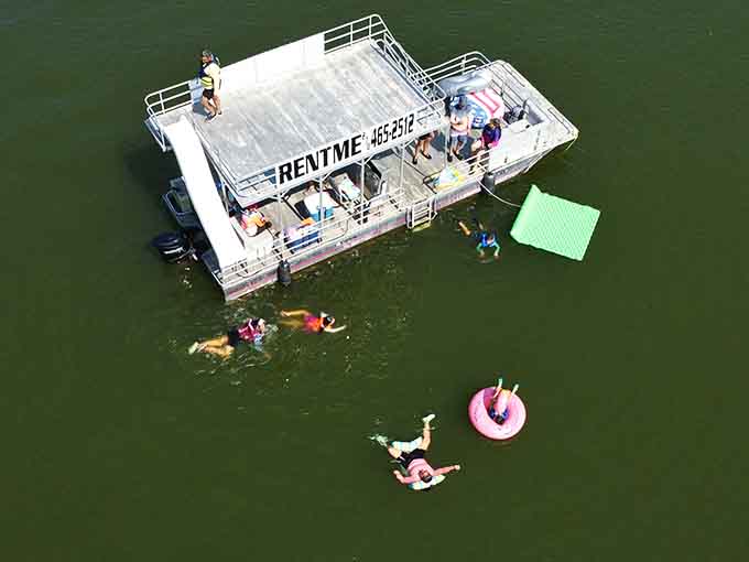 Pontoon party central shows families and friends creating their own floating fun zone complete with water toys and laughter.