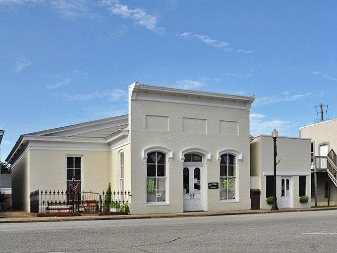 The library&rsquo;s clean lines and arched windows reflect a thoughtful restoration that honors its history without becoming overly ornate or &ldquo;precious&rdquo; about it.