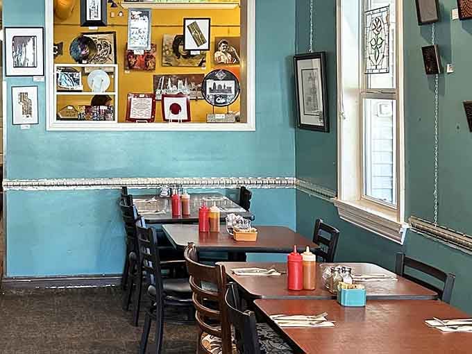 Cozy tables and eclectic art make every seat in the house feel like the best seat available.