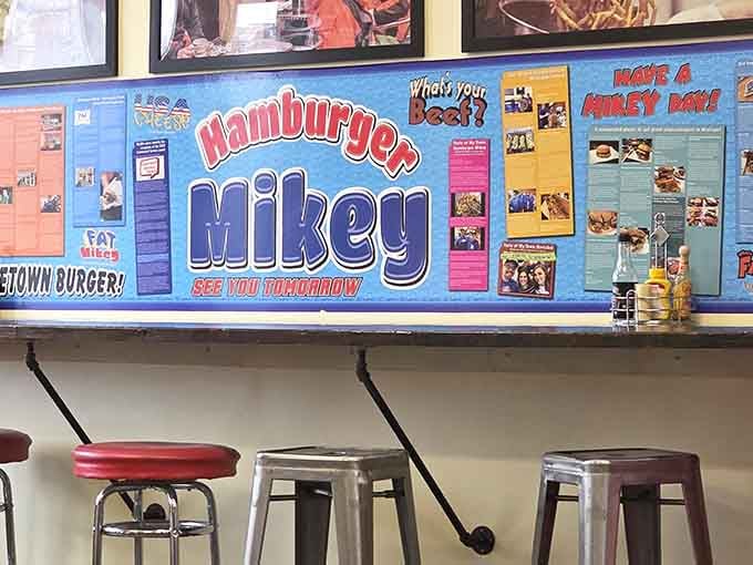 High-top seating with a view of the action, because watching burgers being made is basically dinner theater.