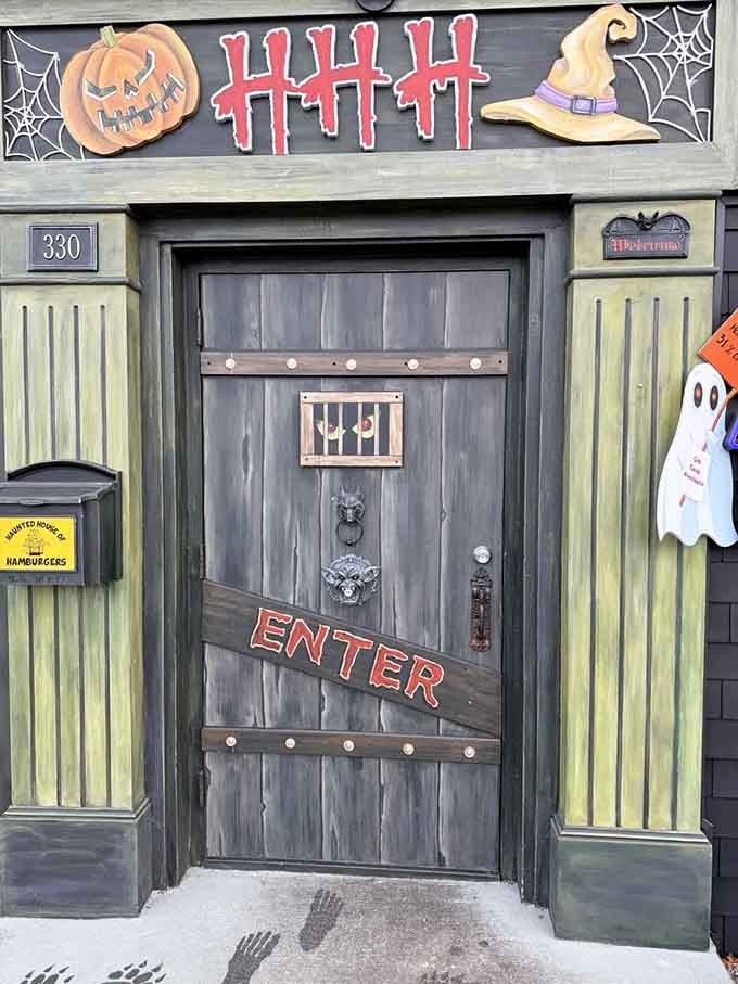 The entrance door warns you're about to enter something special, with footprints suggesting previous diners may have fled in excitement.