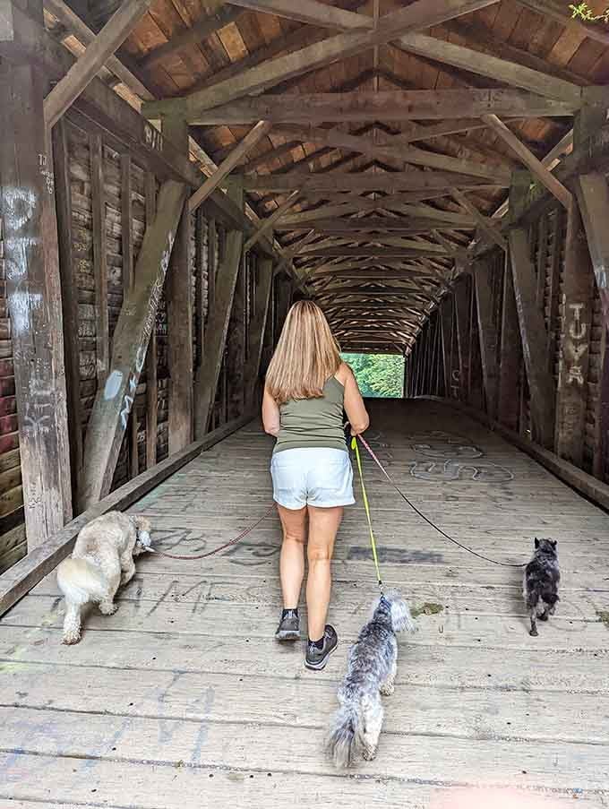 The bridge welcomes all visitors, including four-legged friends who appreciate good architecture as much as anyone does.