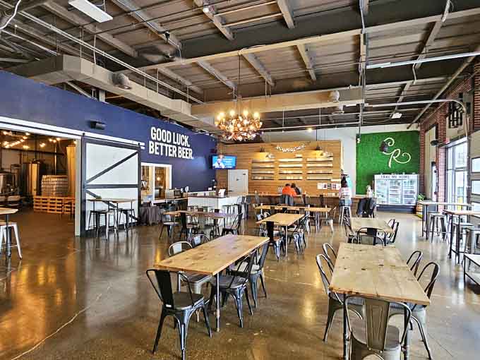 Craft beer in a space that perfectly balances industrial cool with neighborhood warmth and welcome.