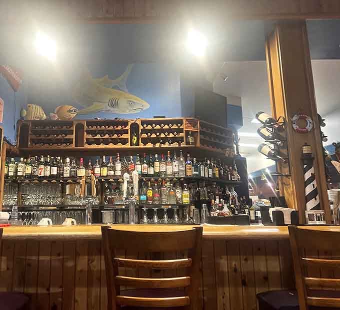 A well-stocked bar with nautical decor means someone understands that seafood feasts require proper liquid accompaniment.