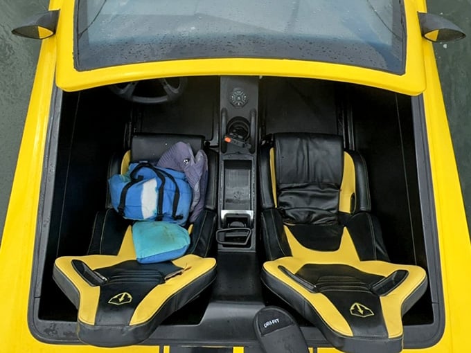 Interior details that remind you this isn't just a boat shaped like a car, it's commitment to the bit.