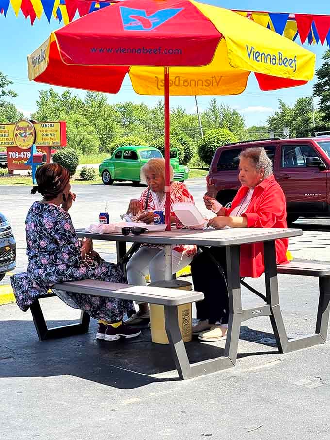Nothing beats sharing a meal under a bright umbrella with good friends on a beautiful summer day in the suburbs.