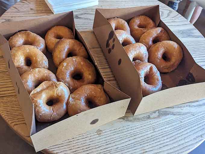Glazed donuts that shine like edible gold, proving simplicity done right beats fancy every single time.