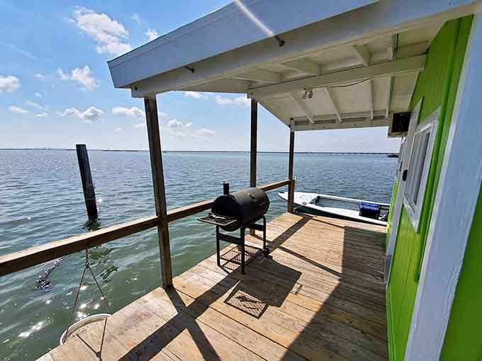 Your deck comes equipped with a grill, because cooking dinner while floating is peak Texas ingenuity.