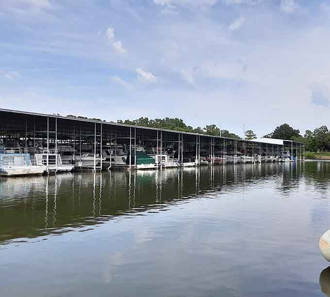 Covered boat slips protecting your watercraft like a fancy garage, except wetter and more vacation-oriented than usual.