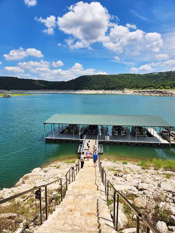 Lake Travis stretches out below like a blue ribbon gift-wrapped by Mother Nature herself for your viewing pleasure.