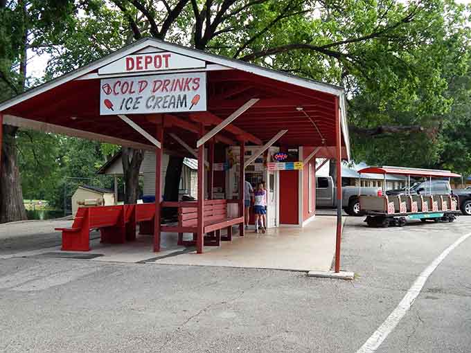 That charming depot serves cold drinks and ice cream, because someone understood that happiness often comes in frozen form.